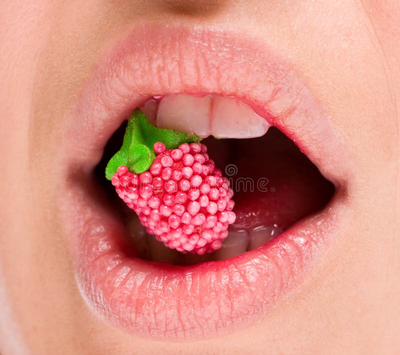 Female Lips with Raspberry in Studio Stock Photo - Image of close ...