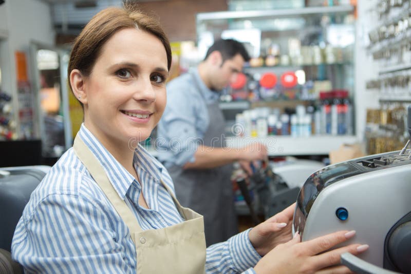 Female locksmith at work stock image. Image of structure - 186143701