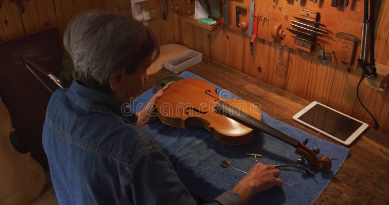 Female Luthier at Work in Her Workshop Stock Video - Video of mirror ...
