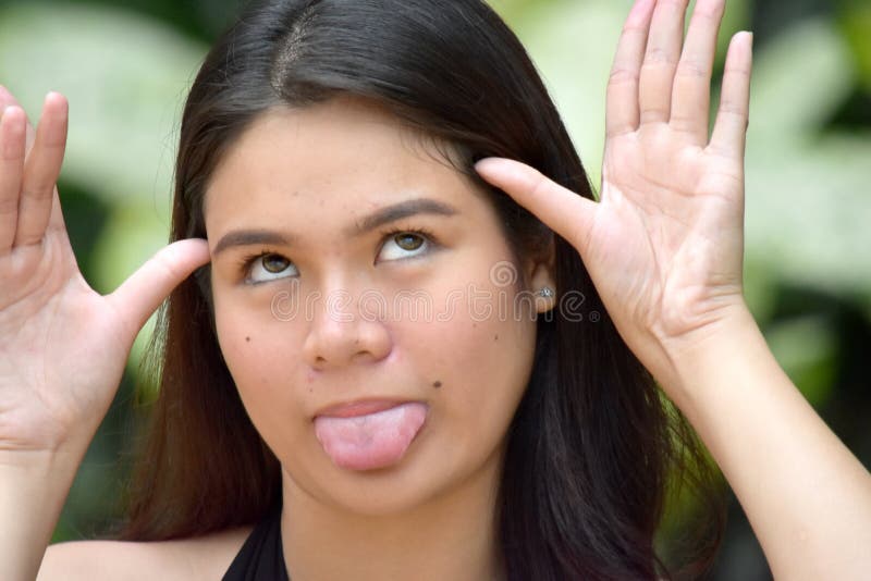 Female Making Funny Faces stock image. Image of funny - 141638639