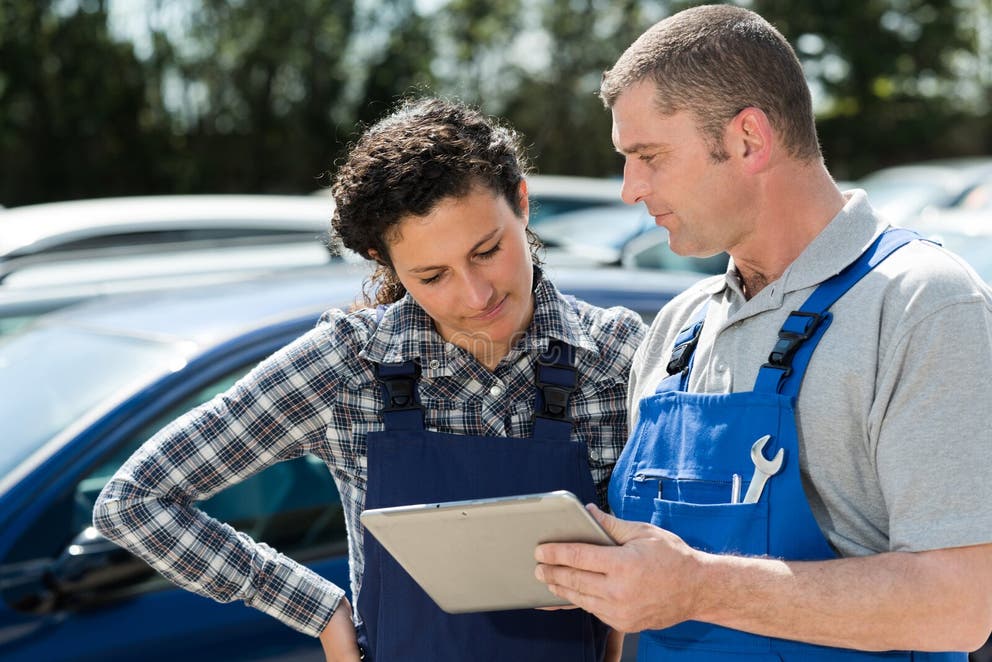 Female and Male Workers in Junkyard Stock Image - Image of mechanics ...