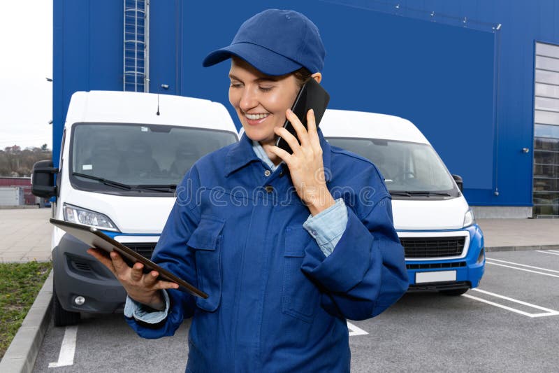 Female Manager with a Digital Tablet and Smartphone on the Background ...