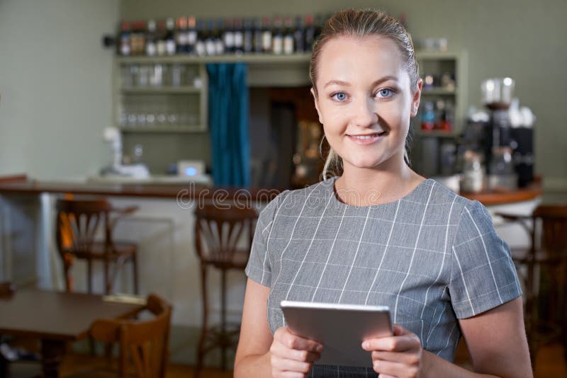 Portrait of Female Manager in Restaurant with Digital Tablet Stock ...