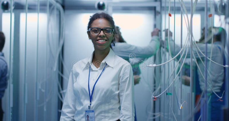 Female Manager Smiling in Data Center Stock Image - Image of engineer ...