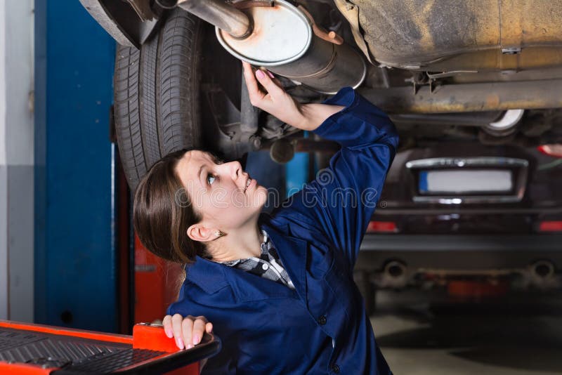 Female Master is Repairing Car on Her Workplace Stock Image - Image of ...