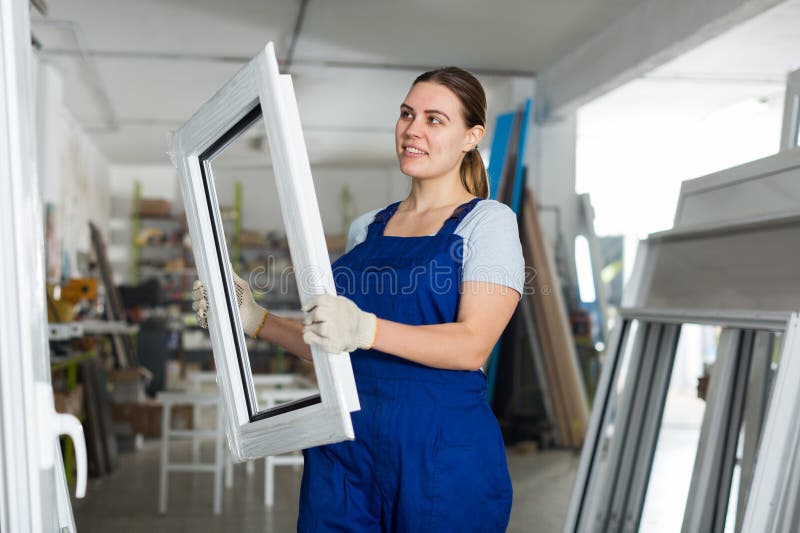 Female Master is Working with Window Frame Stock Image - Image of ...