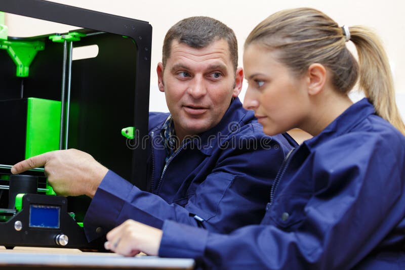 Female Material Engineering Apprentice Pointing Stock Photo - Image of ...
