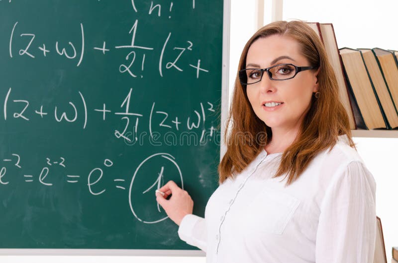 The Female Math Teacher in the Classroom Stock Photo - Image of lesson ...