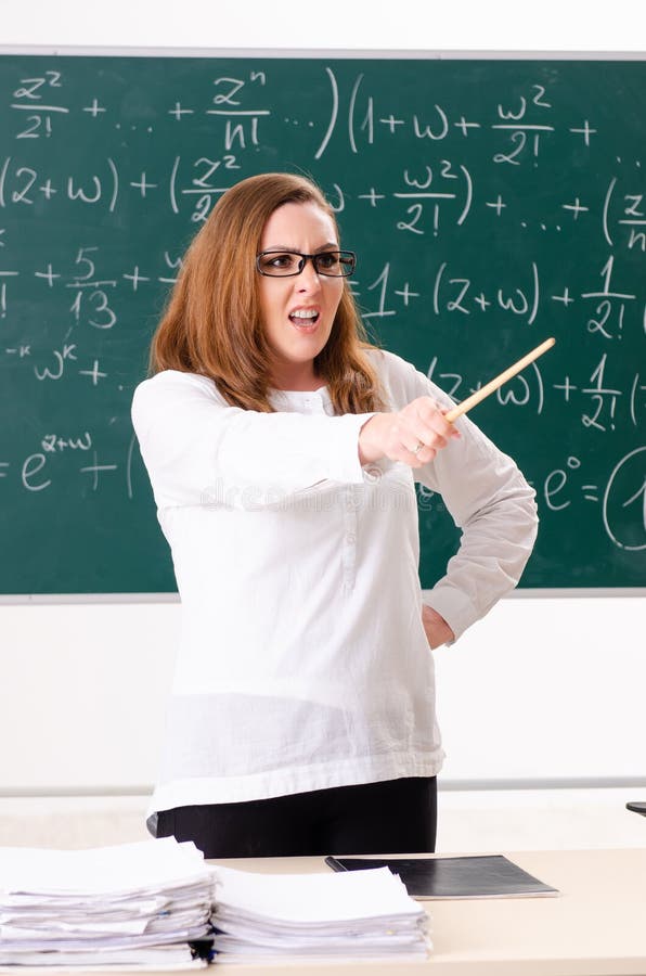 The Female Math Teacher in the Classroom Stock Photo - Image of lesson ...