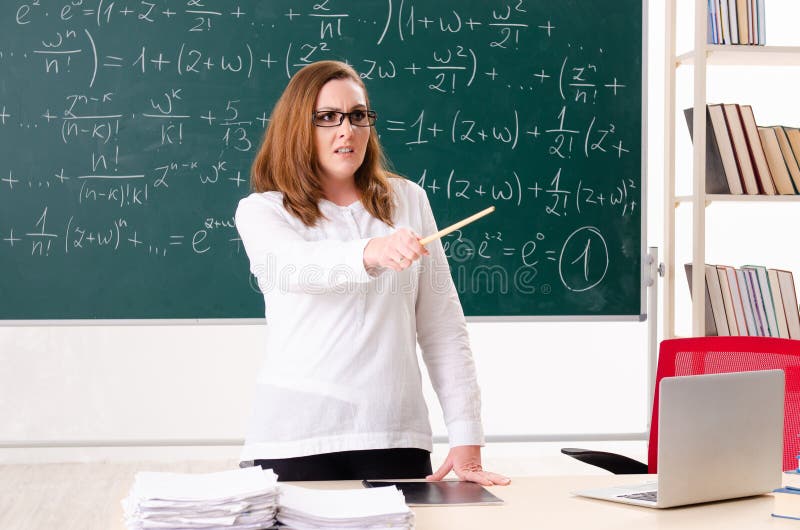 The Female Math Teacher in the Classroom Stock Photo - Image of lesson ...