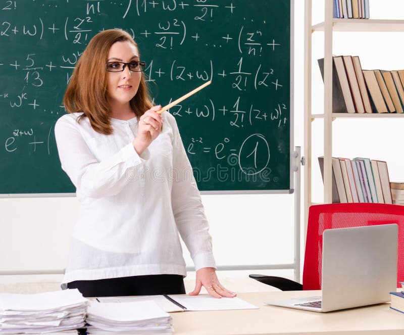 Female Math Teacher in the Classroom Stock Image - Image of algebra ...