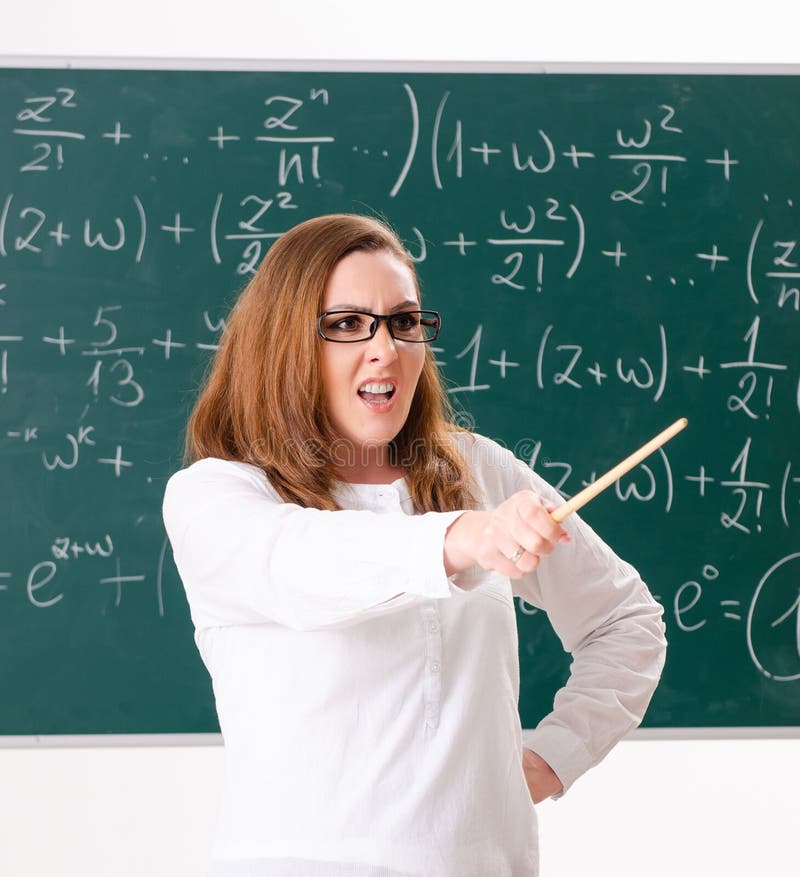 Female Math Teacher in the Classroom Stock Image - Image of algebra ...