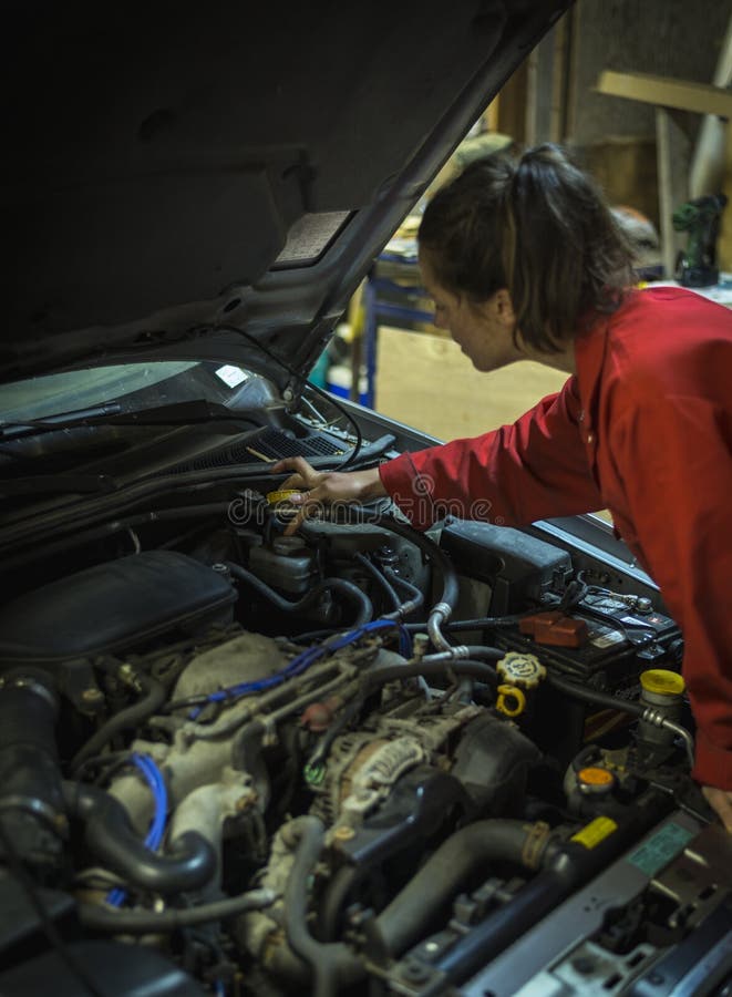 Female Mechanic Inspecting Car Engine Stock Image - Image of workshop ...