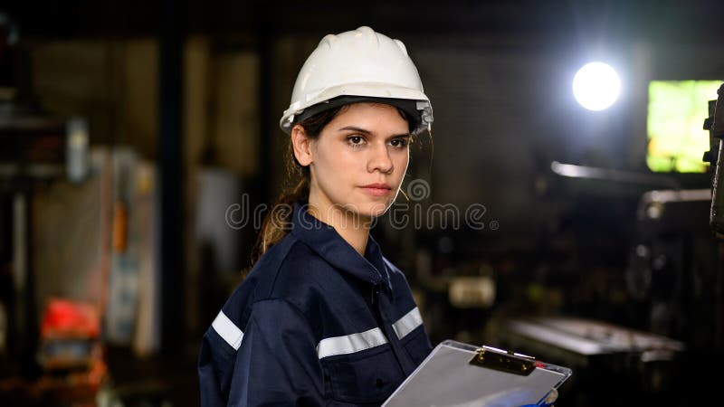 Female Mechanical Engineer Manager Checking and Inspecting Engine ...
