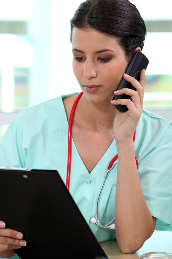 Female medic stock image. Image of portrait, clipboard - 32238455