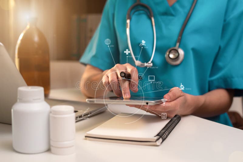 Female Medicine Doctor Hand Holding Silver Pen Writing Something on ...