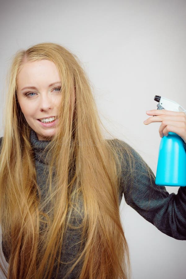 Female Messy Long Hair Holds Spray Bottle Stock Photo - Image of damage ...