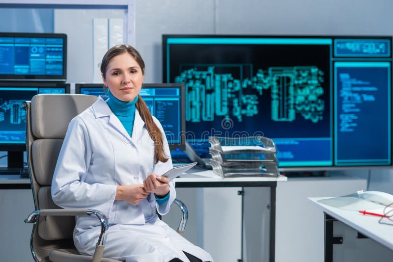Female Microelectronics Engineer Works in a Scientific Laboratory on ...
