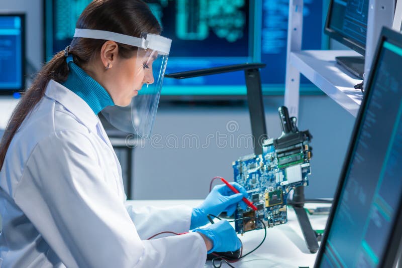 Female Microelectronics Engineer Works in a Scientific Laboratory on ...