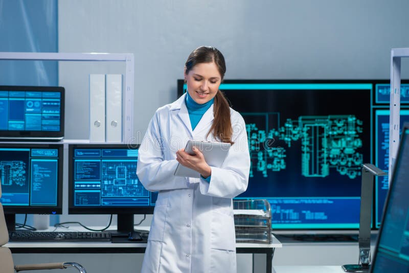 Female Microelectronics Engineer Works in a Scientific Laboratory on ...