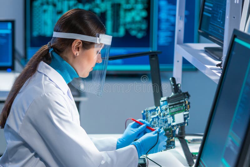 Female Microelectronics Engineer Works in a Scientific Laboratory on ...