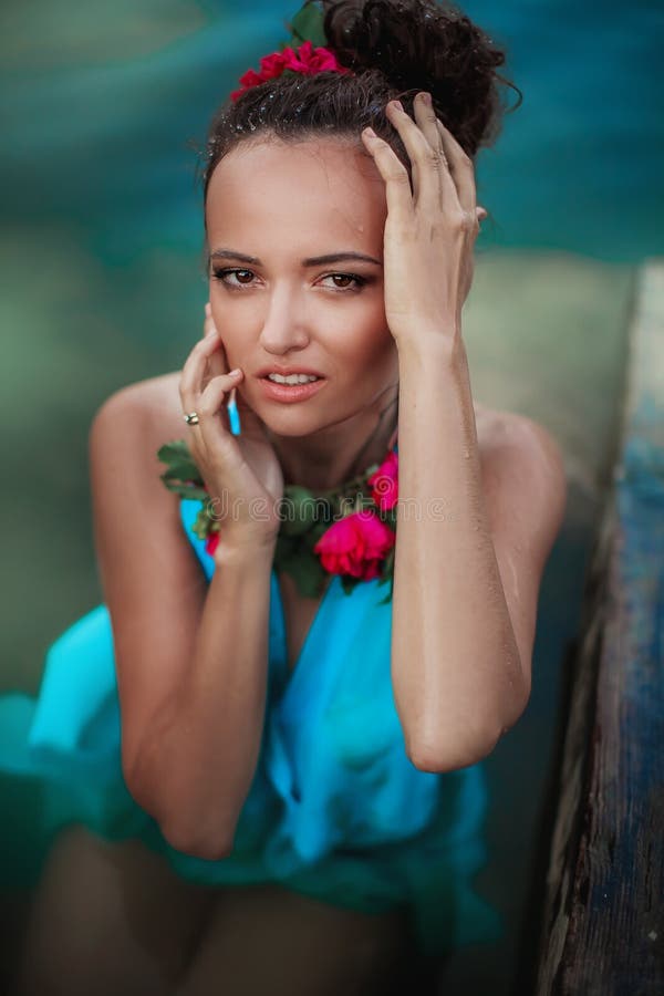Female Model in Blue Dress and Stage Makeup Posing in Water Stock Image ...