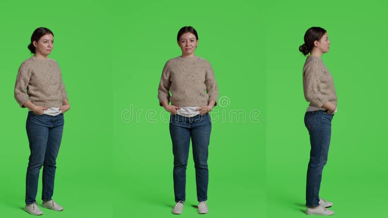 Female Model Posing on Full Body Greenscreen Backdrop Stock Video ...