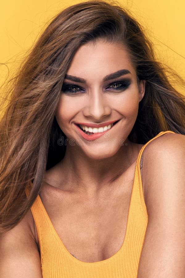 Female Model Posing on Yellow. Stock Photo - Image of cheerful ...