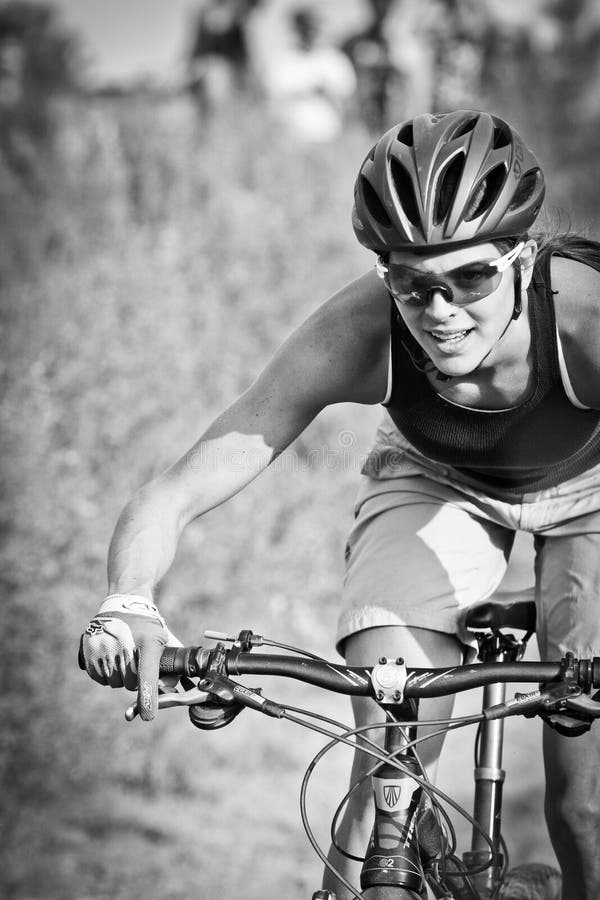 Female Mountain Bike Rider editorial photo. Image of bike - 21235546