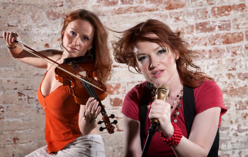 Female musicians stock photo. Image of rock, sultry, brown - 14551972