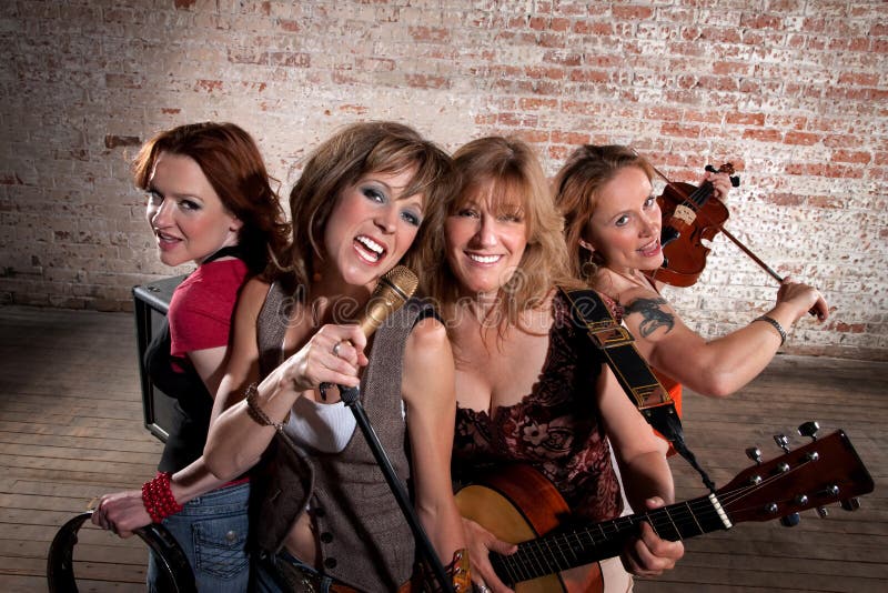 Female Musicians stock image. Image of bricks, folk, music - 14583157