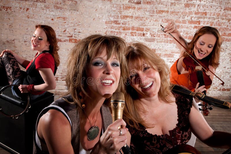 Female musicians stock photo. Image of perform, guitar - 14857498