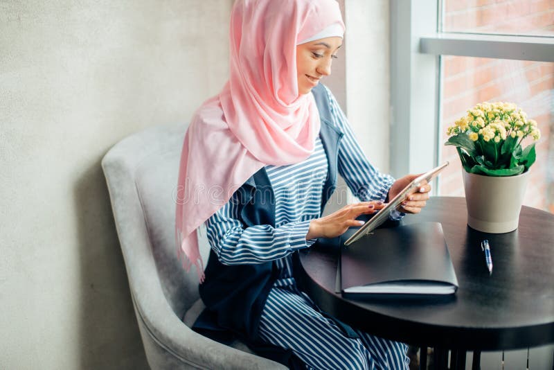 Pretty Muslim Woman Use Tablet in Cafe Stock Image - Image of media ...