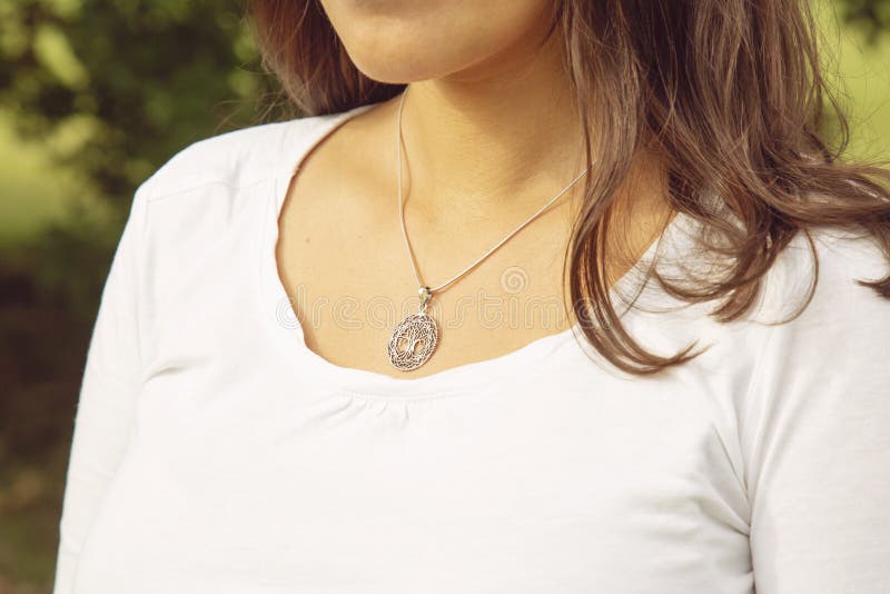 Female Neckline Wearing Tiny Silver Chain with Silver Pendant Stock ...