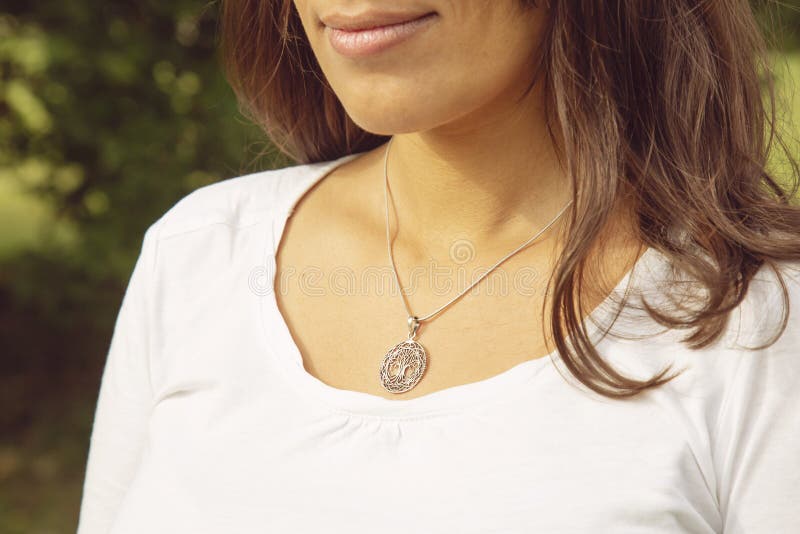 Female Neckline Wearing Tiny Silver Chain with Silver Pendant Stock ...