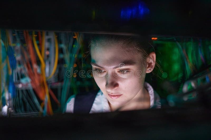 Female Network Engineer Using Laptop Side View Stock Photo - Image of ...