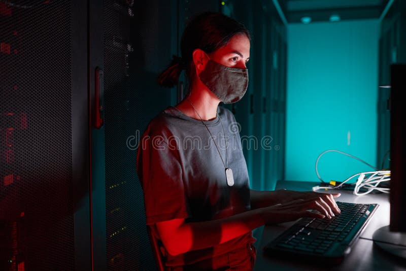 Female Network Engineer Wearing Mask in Data Center Stock Photo - Image ...