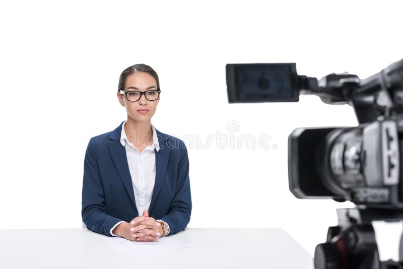 Female Newscaster in Suit Sitting in Front of Camera, Stock Image ...