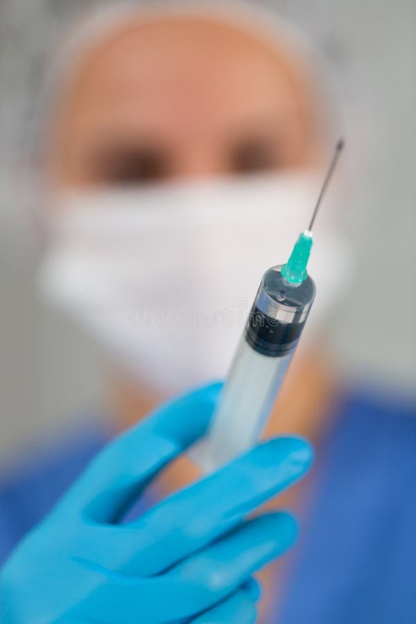 Nurse Ready To Make Injection in Hospital Stock Photo - Image of ...