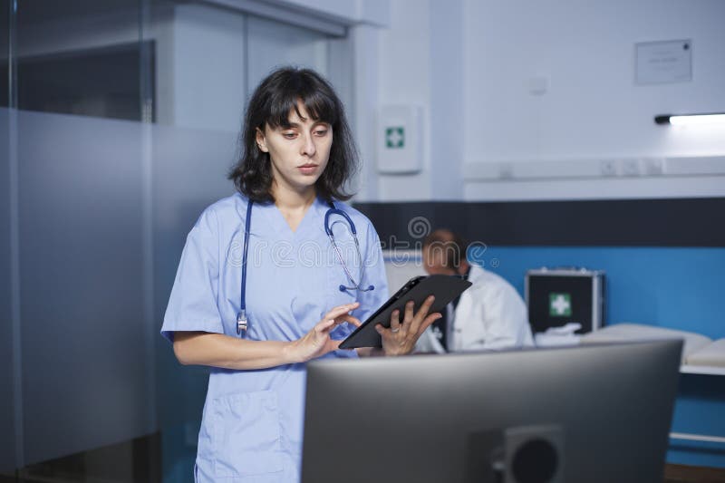Female Nurse Using Modern Technology Stock Photo - Image of technology ...