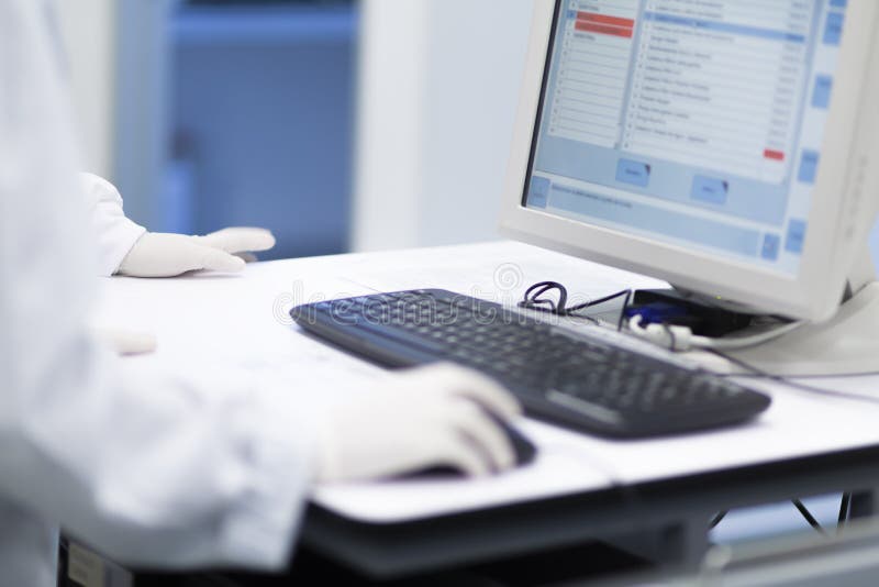 Female Nurse Working on Laptop Computer Stock Photo - Image of care ...