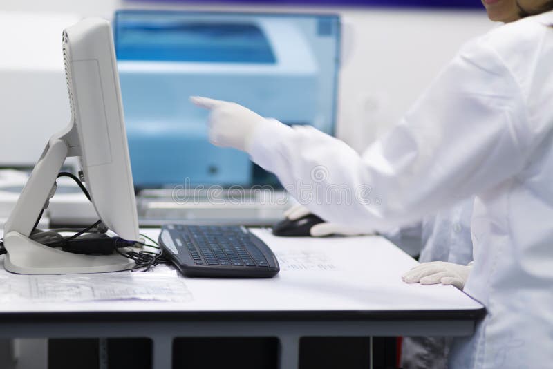 Female Nurse Working on Laptop Computer Stock Image - Image of hand ...