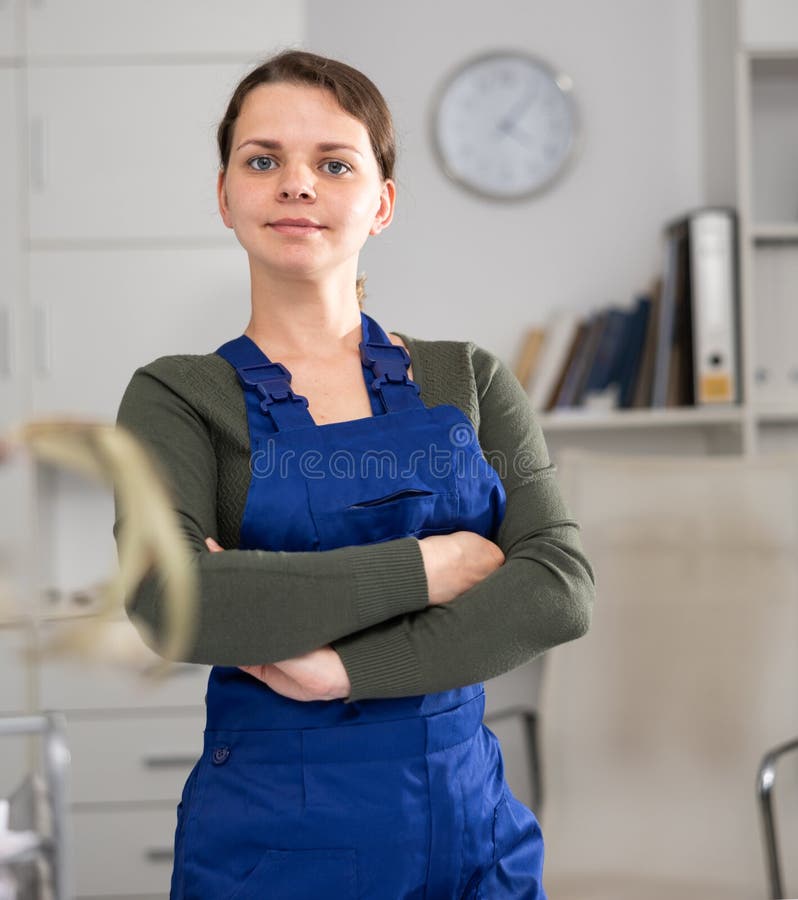 Female Office Cleaner is Satisfied after Cleaning in Office Stock Photo ...