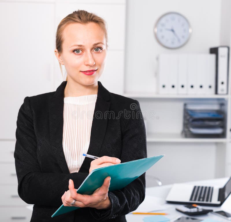 Female in the Office Standing with Folder Stock Photo - Image of ...