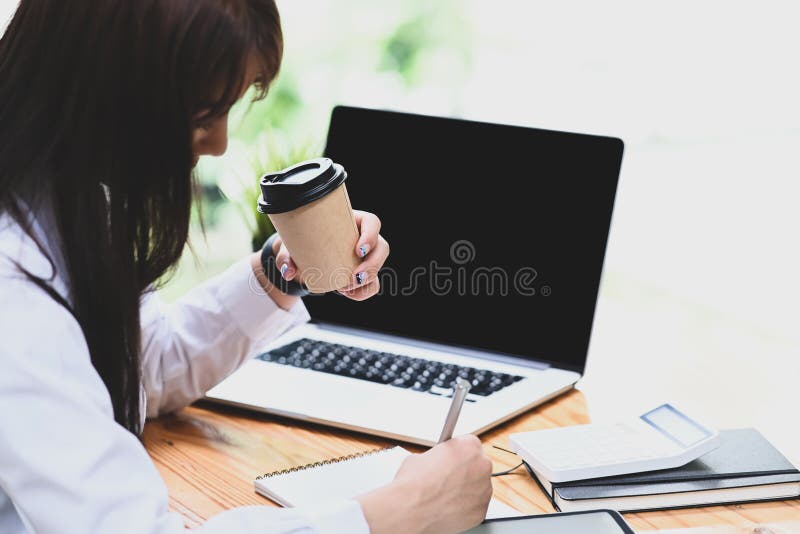 Office Worker Drinking Coffee and Working at Office. Stock Image ...