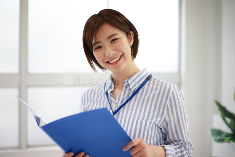Female Office Worker with a File Stock Image - Image of japanese ...