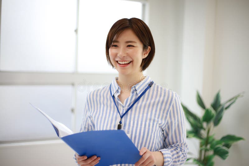 Female Office Worker with a File Stock Image - Image of female, person ...
