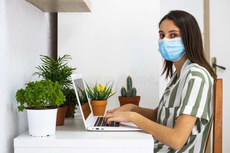 Female Office Worker with Mask at Work. Concept of Worker with Mask ...