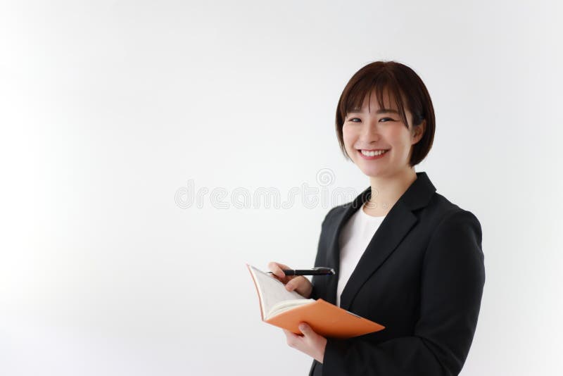 Female Office Worker with a Schedule Book Stock Photo - Image of ...