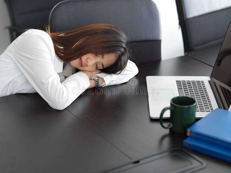 Female Office Worker Taking Nap on the Table in Office Room, Relaxing ...